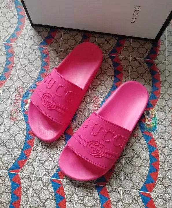 Gucci Unisex Gucci logo rubber slide sandal Pink - AlimorLuxury