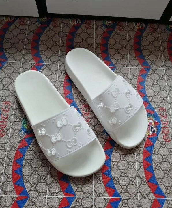 Gucci Unisex rubber GG slide sandal White - AlimorLuxury